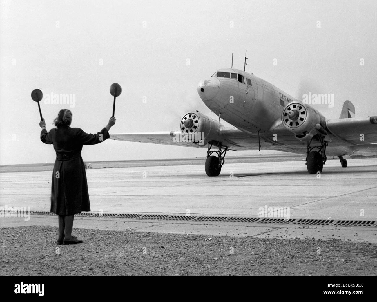Ruzyne airport, tarmac, ground personnel, Li-2 airplane, aircraft Stock ...
