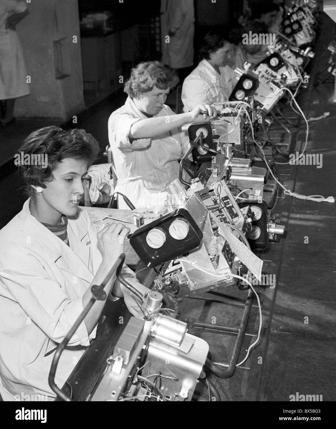 Female employees of Tesla factory assemble tv sets "Ametyst" at Prague ...