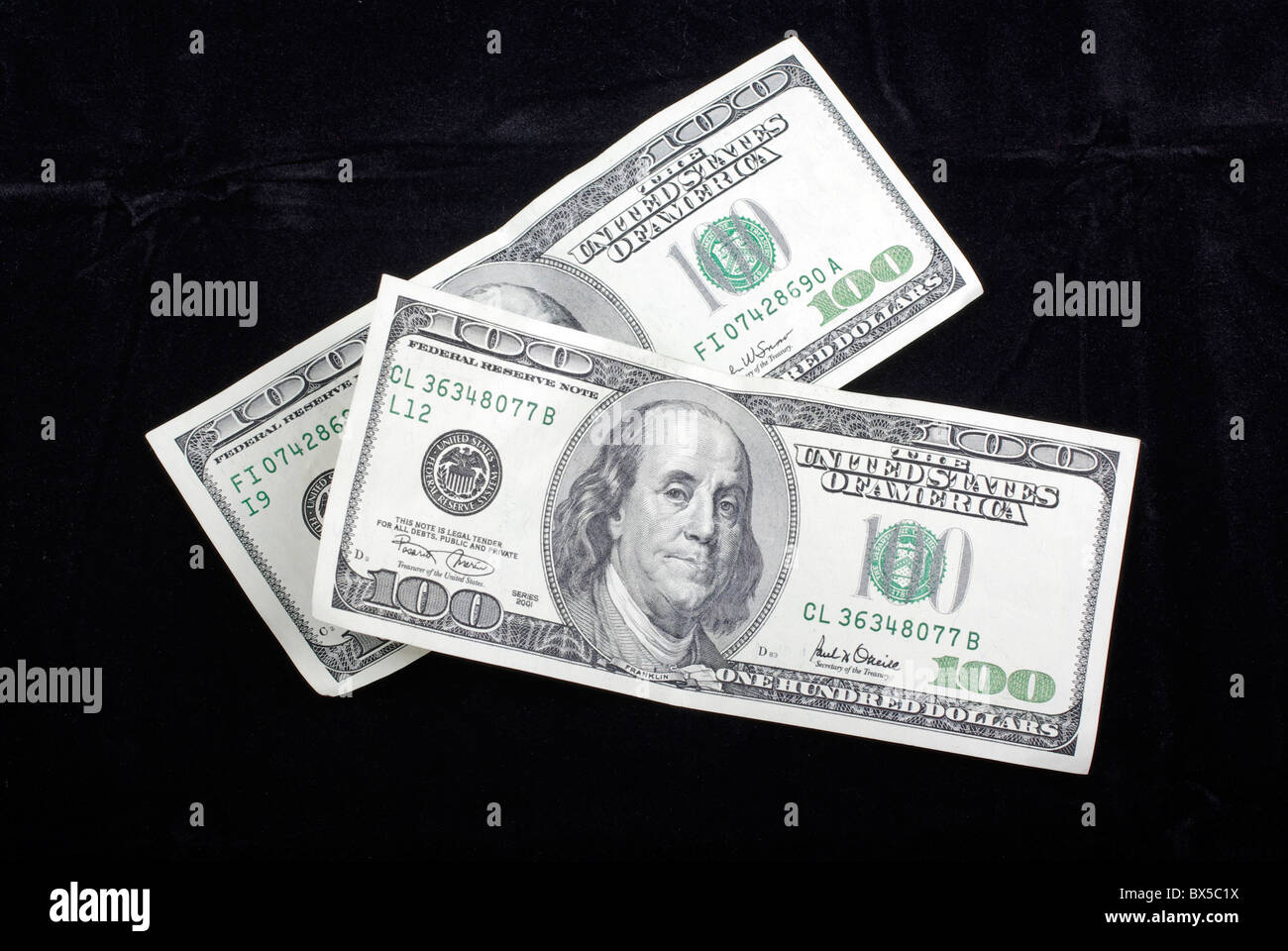 US Dollars banknotes isolated on black velvet background Stock Photo ...