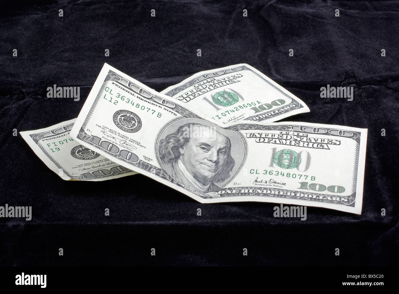 US Dollar currency banknotes isolated on black velvet background Stock ...