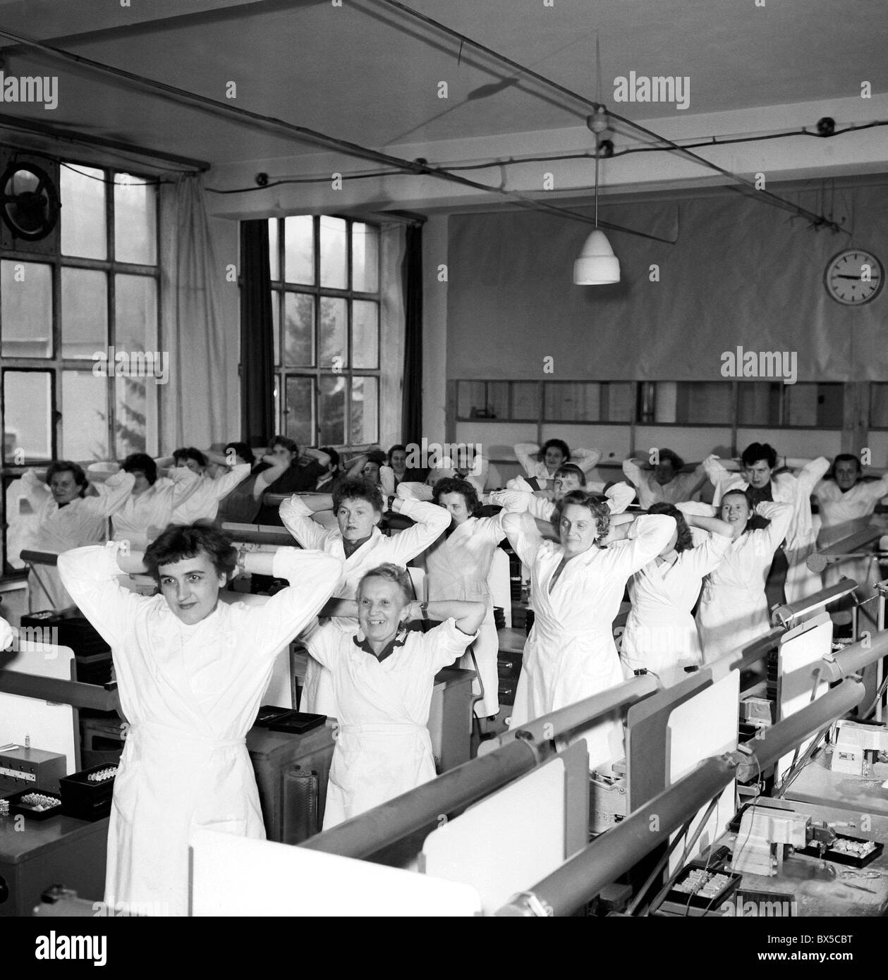 Tesla factory workers exercise in between tasks in Vrchlabi ...