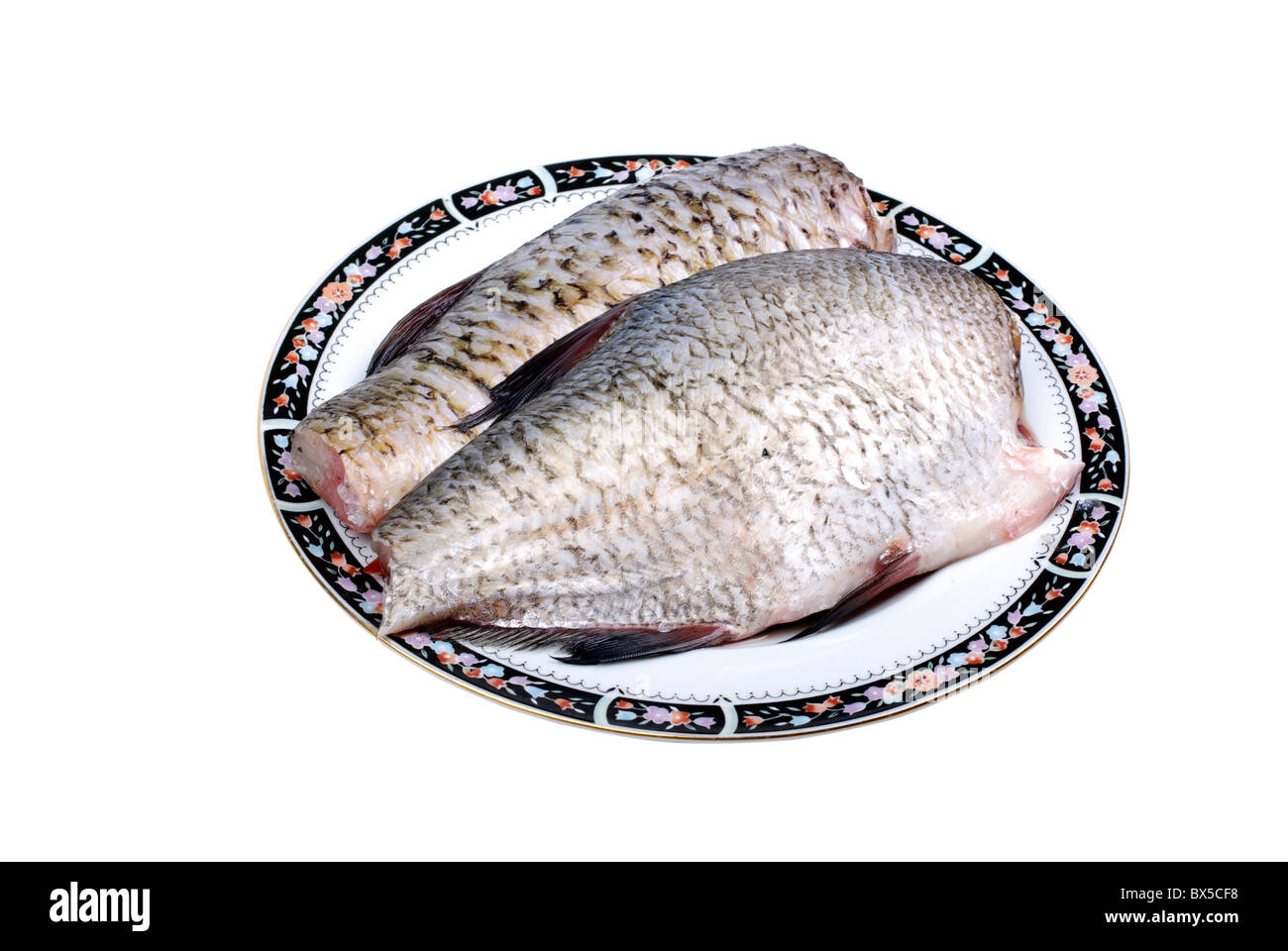 Two fishes ready for preparing isolated on white background Stock Photo ...