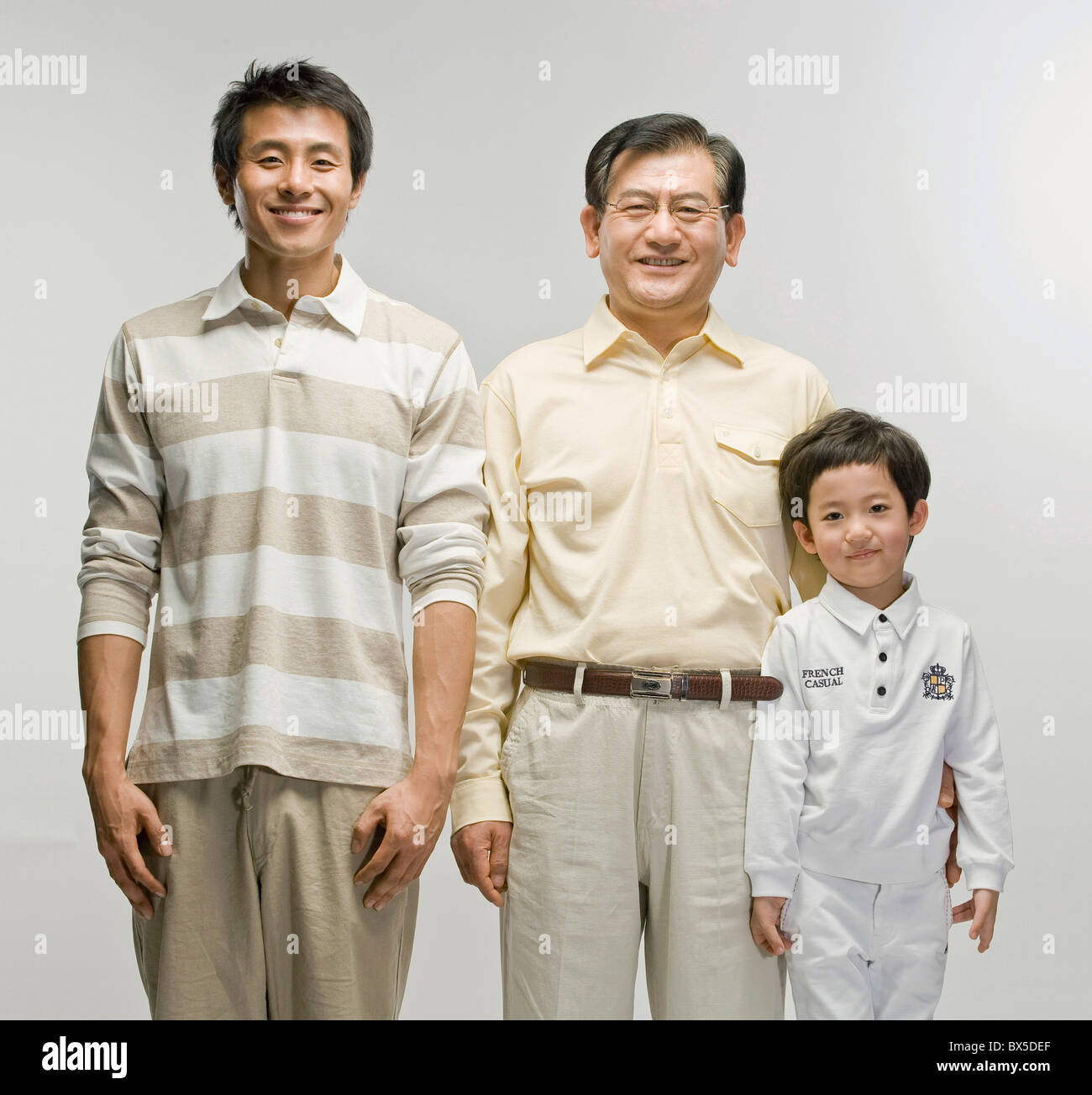 Grandfather father and young teenager son High Resolution Stock ...