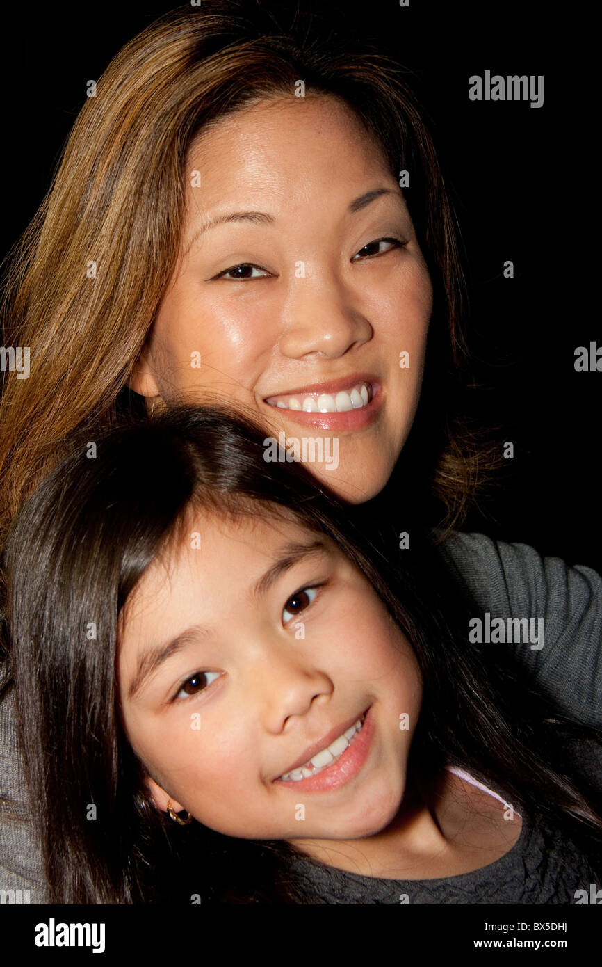 Japanese mother and daughter hugging Stock Photo - Alamy