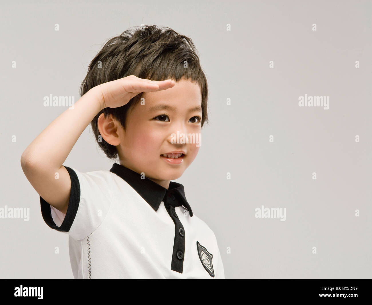 Child saluting hi-res stock photography and images - Alamy