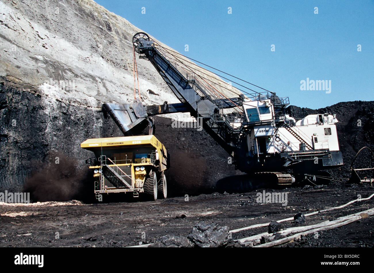 Coal, surface mine, P & H Electric shovel loading rough service dump ...