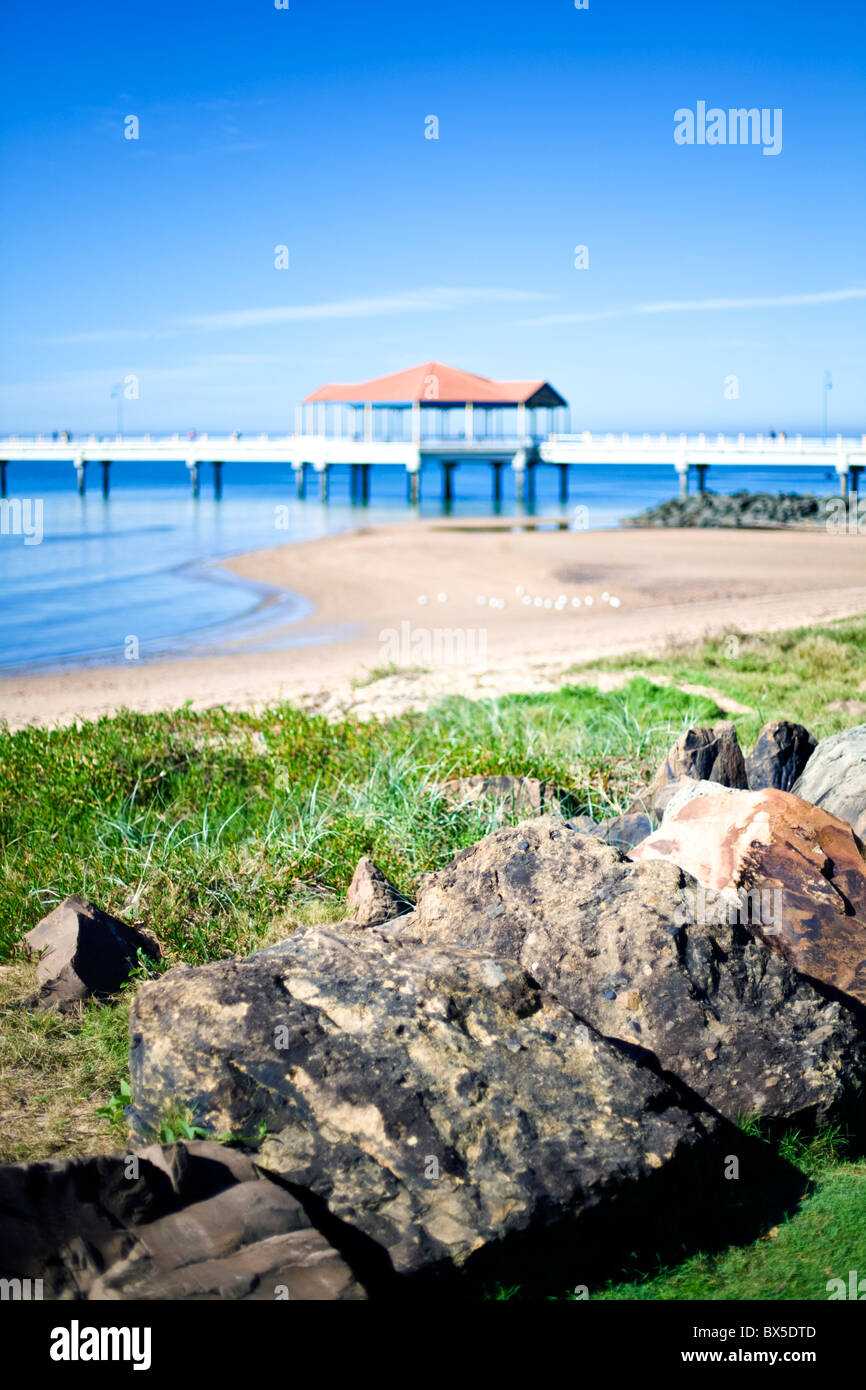 Coastal beach with jetty in background at Scarborough Queensland ...