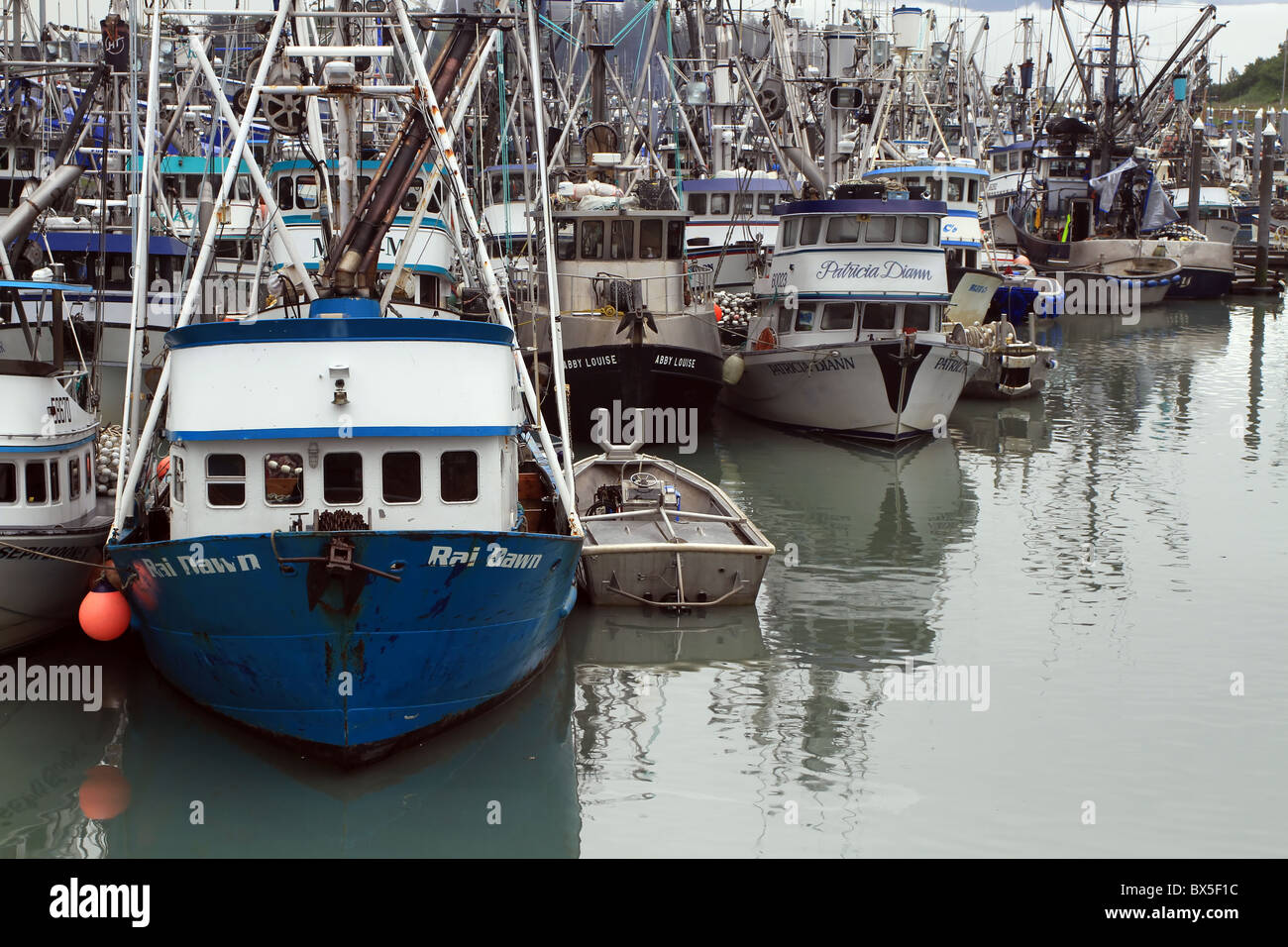 Many fishing boats at dock, port, marina in the ocean bay on the Kenai ...