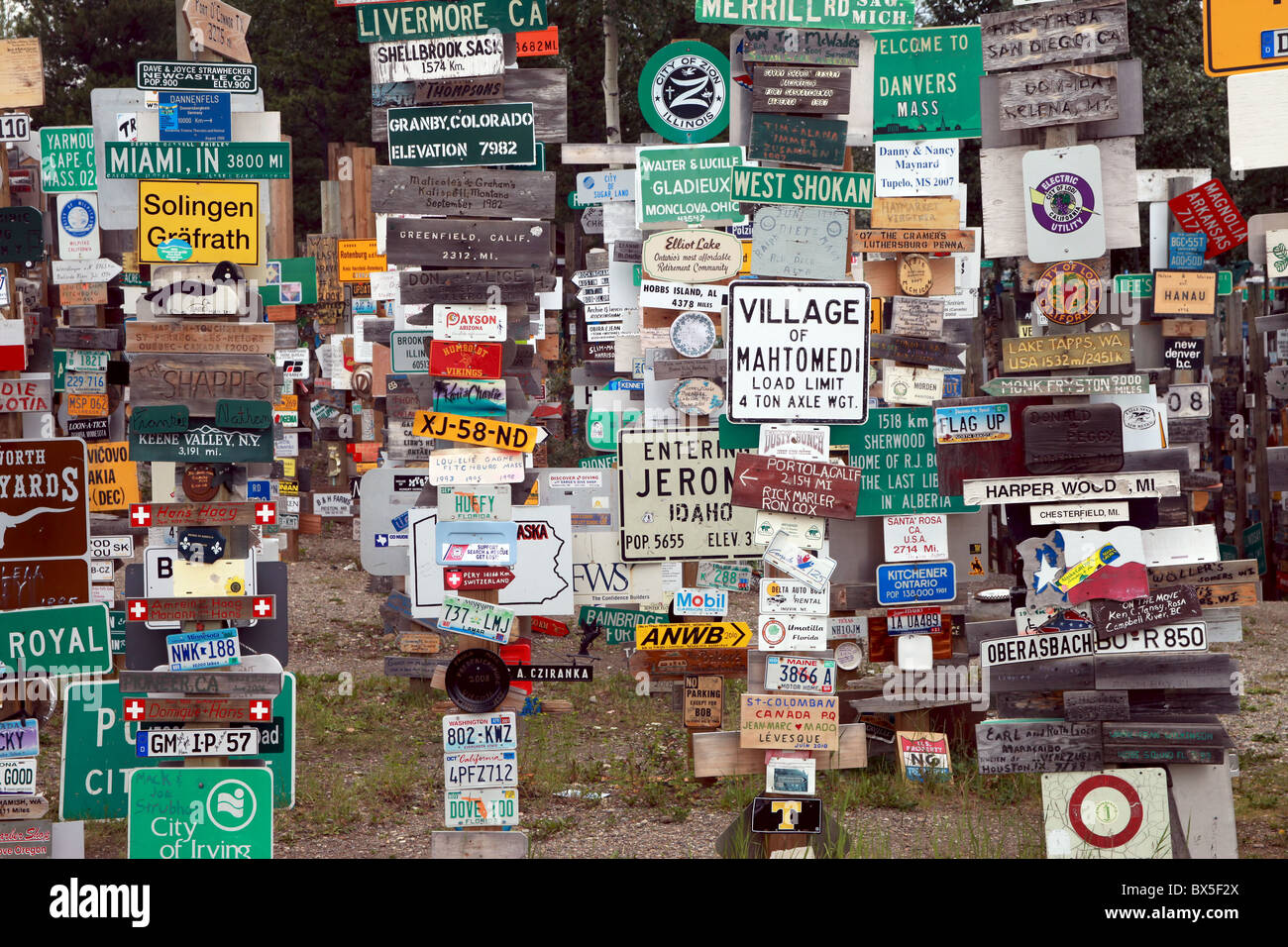 Sign post forest at Watson Lake in the Yukon Territory in Canada with ...