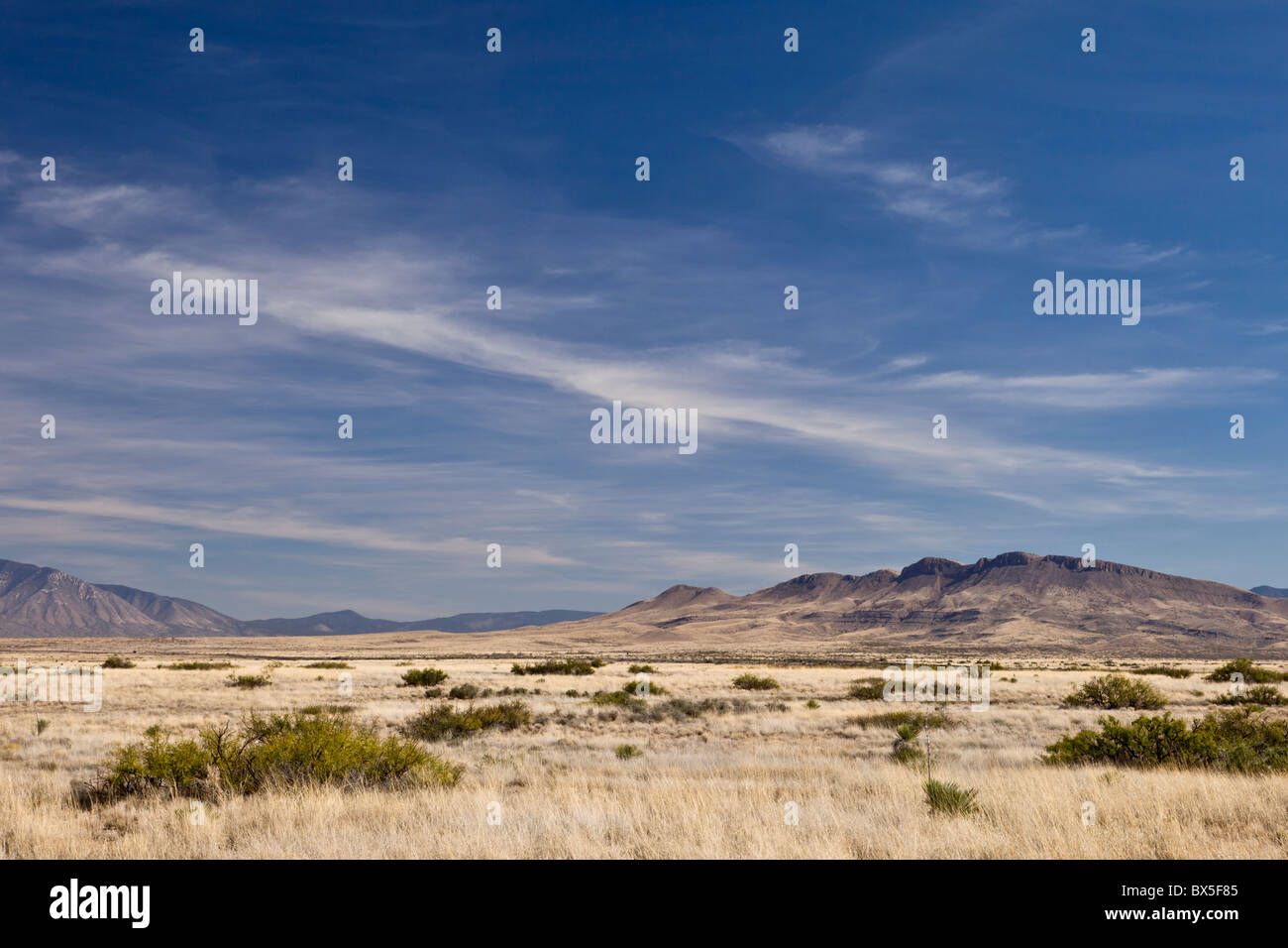 View of mountains and field off of Highway US 54 in New Mexico, USA ...