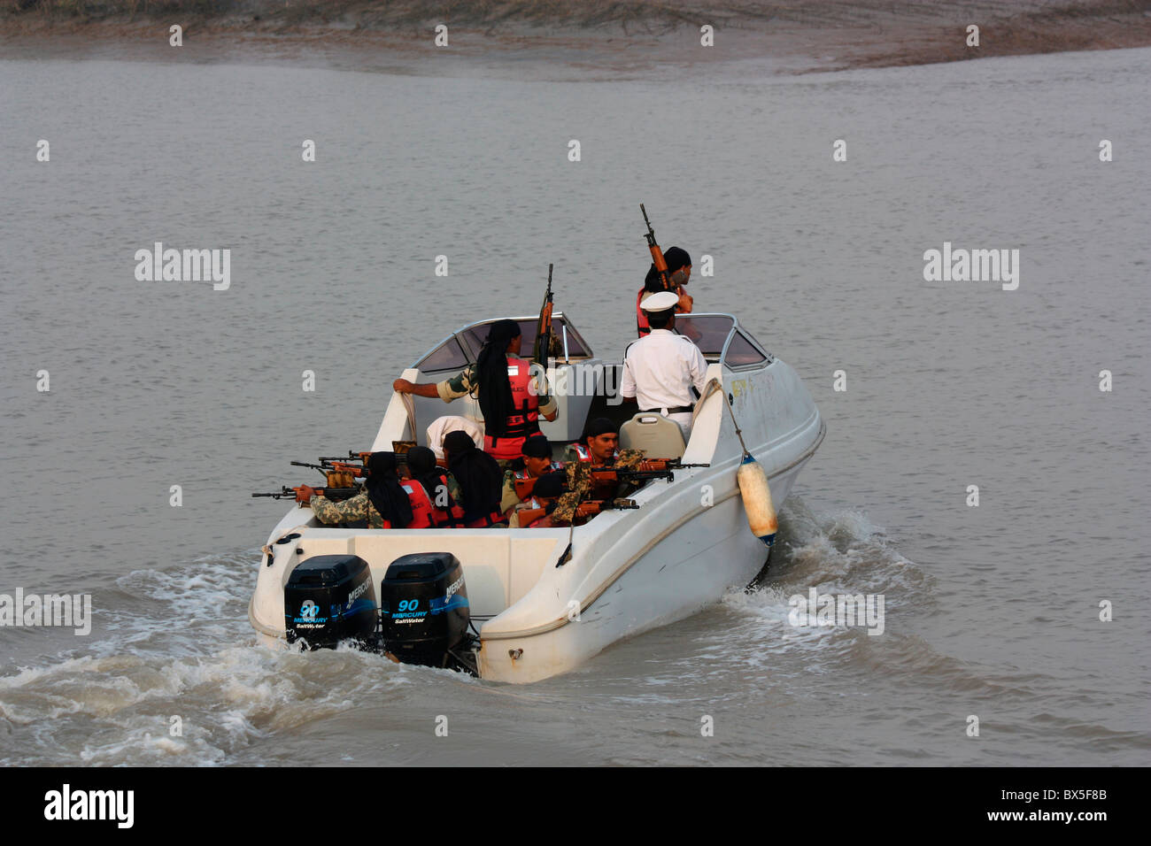 BSF personnel doing boat patrolling in sir creek , Gujarat, India Stock ...