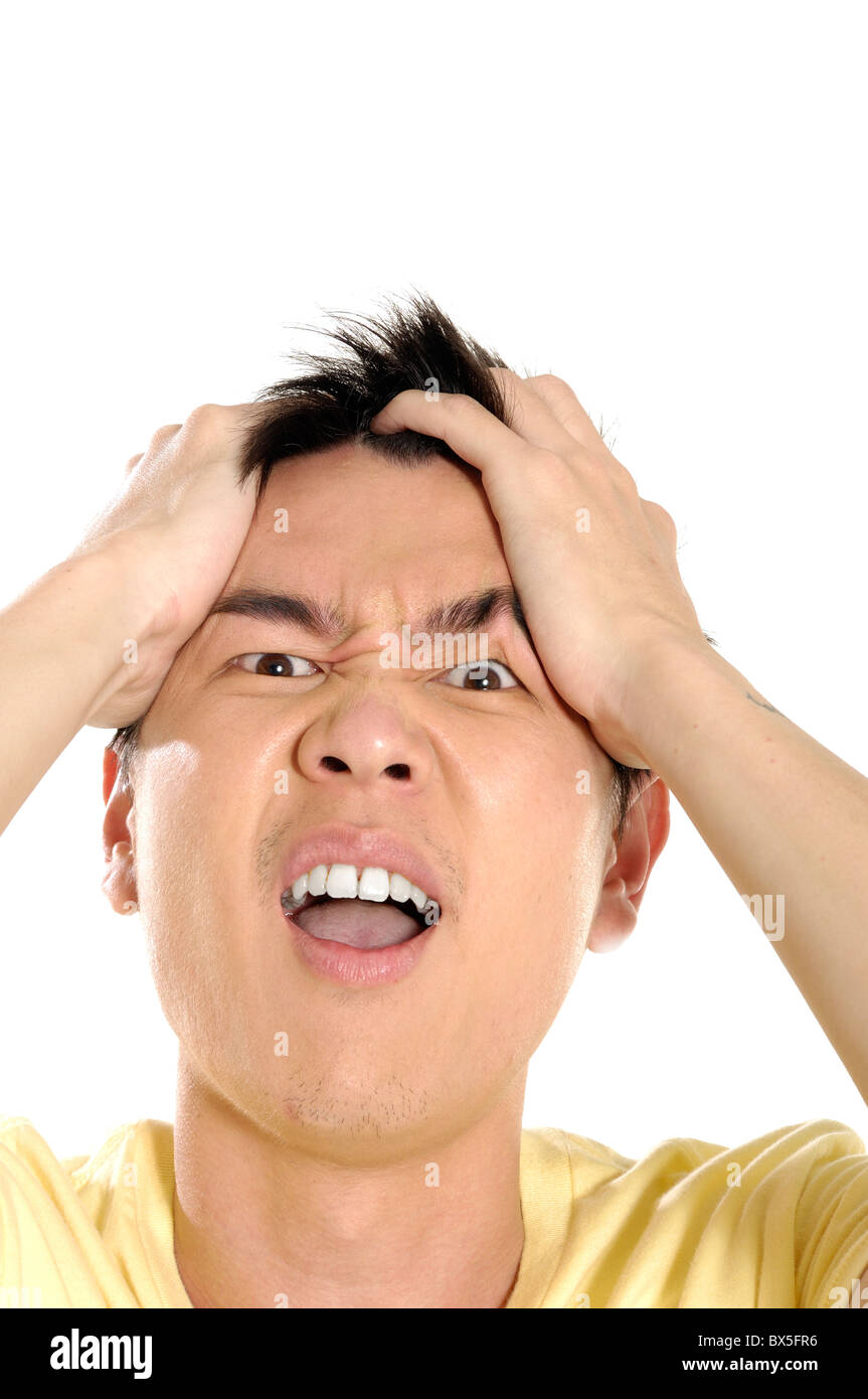 Male university student looking stressed Stock Photo - Alamy