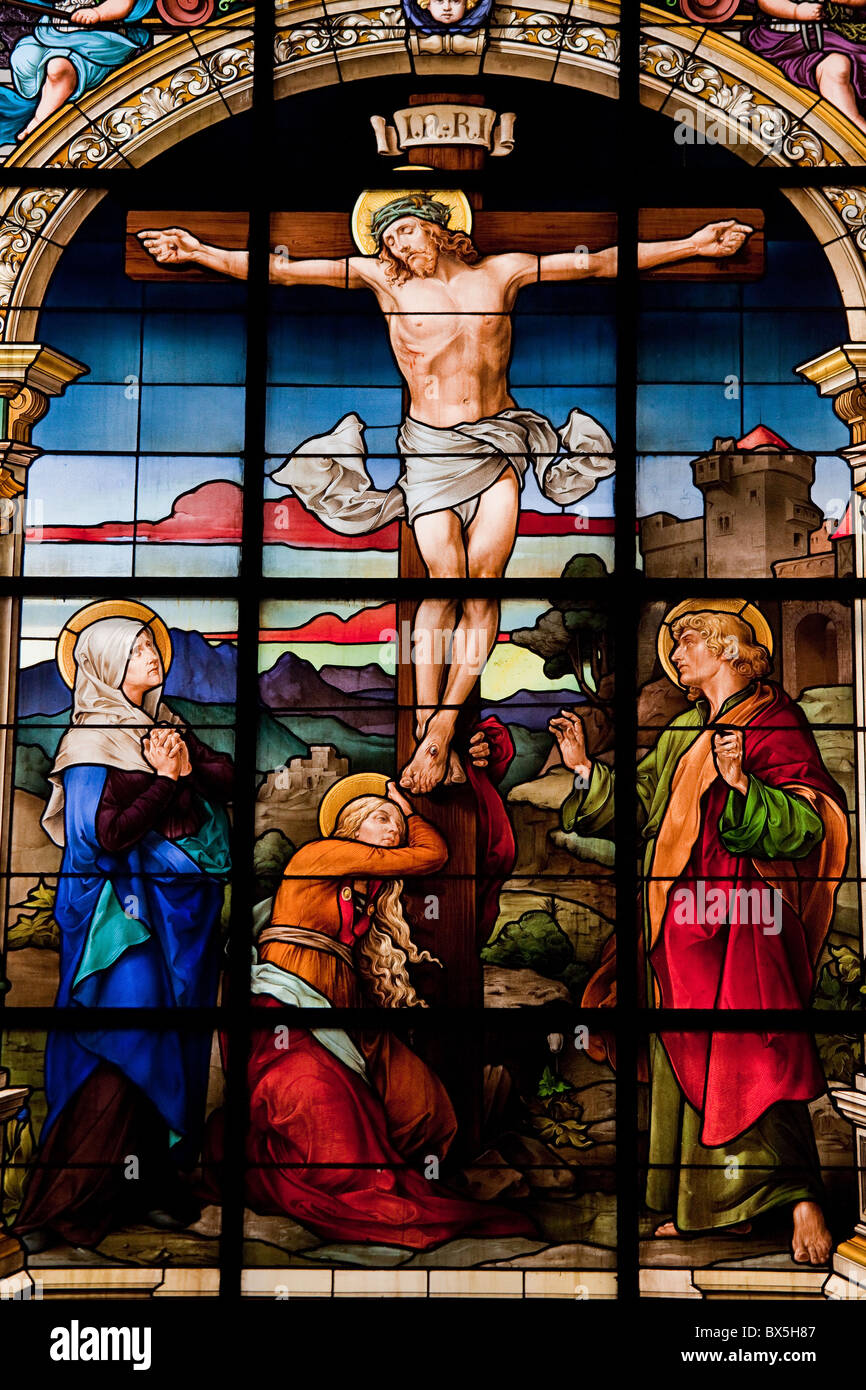Jesus on the cross on Good Friday -Stained Glass Church Window in the ...