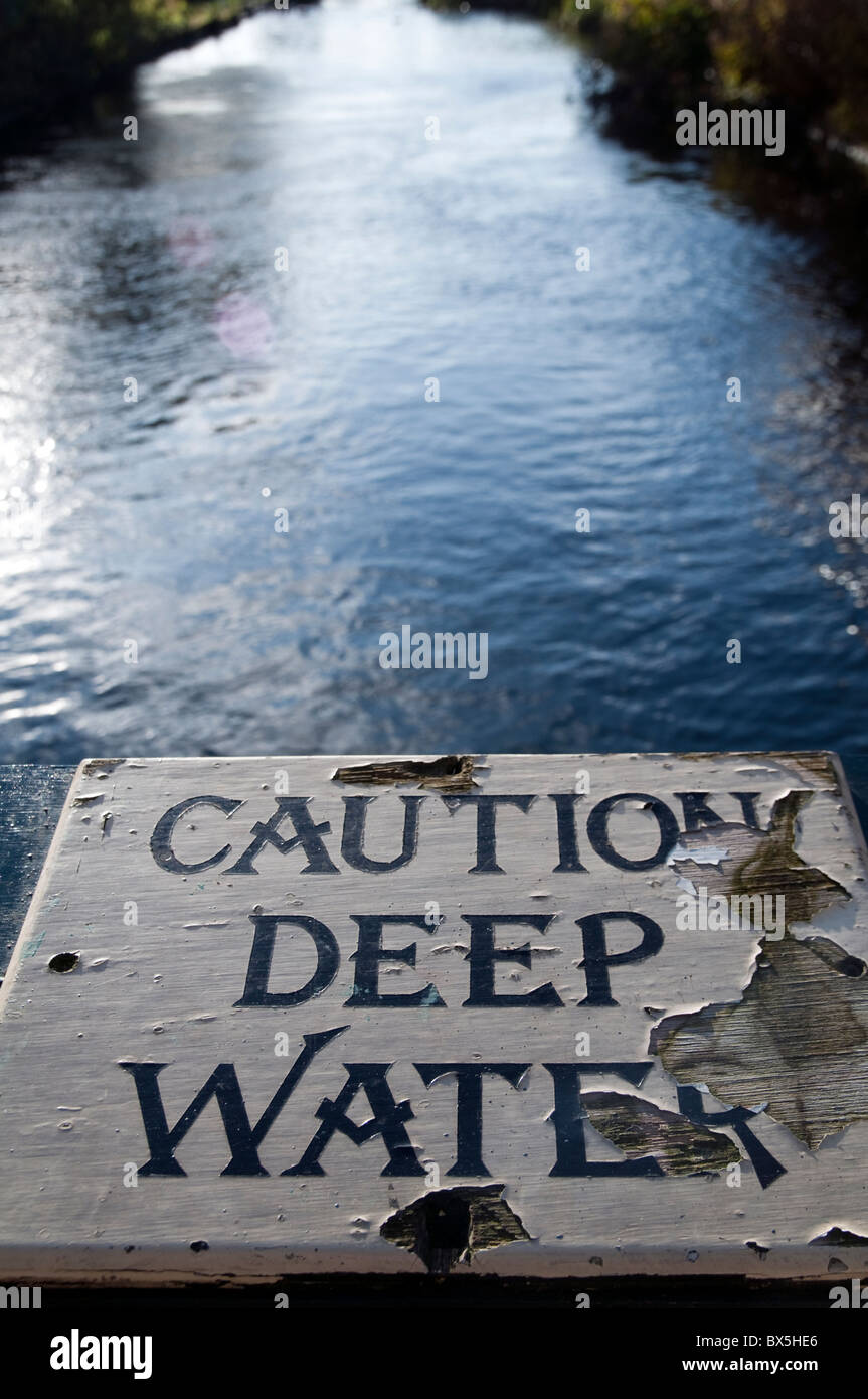 Deep water sign above river Derbyshire East Midlands England Stock ...