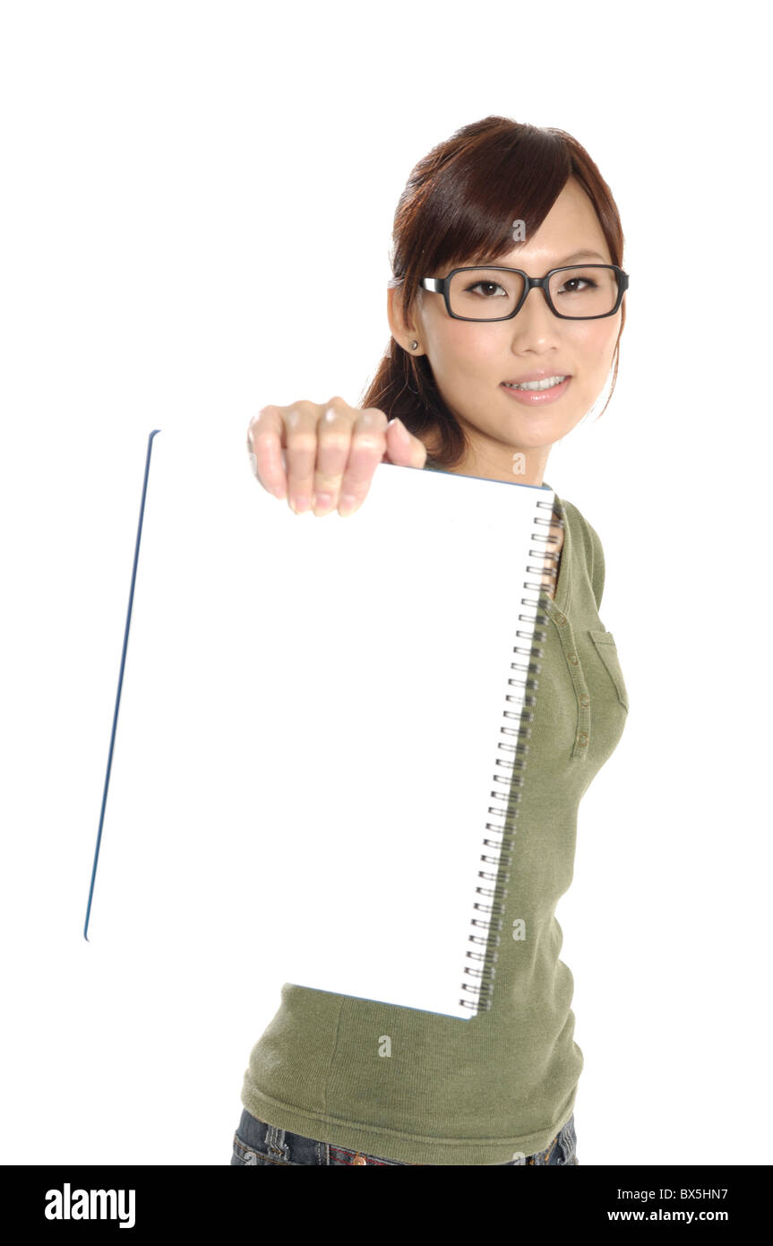 Female university student showing a spiral notebook Stock Photo - Alamy