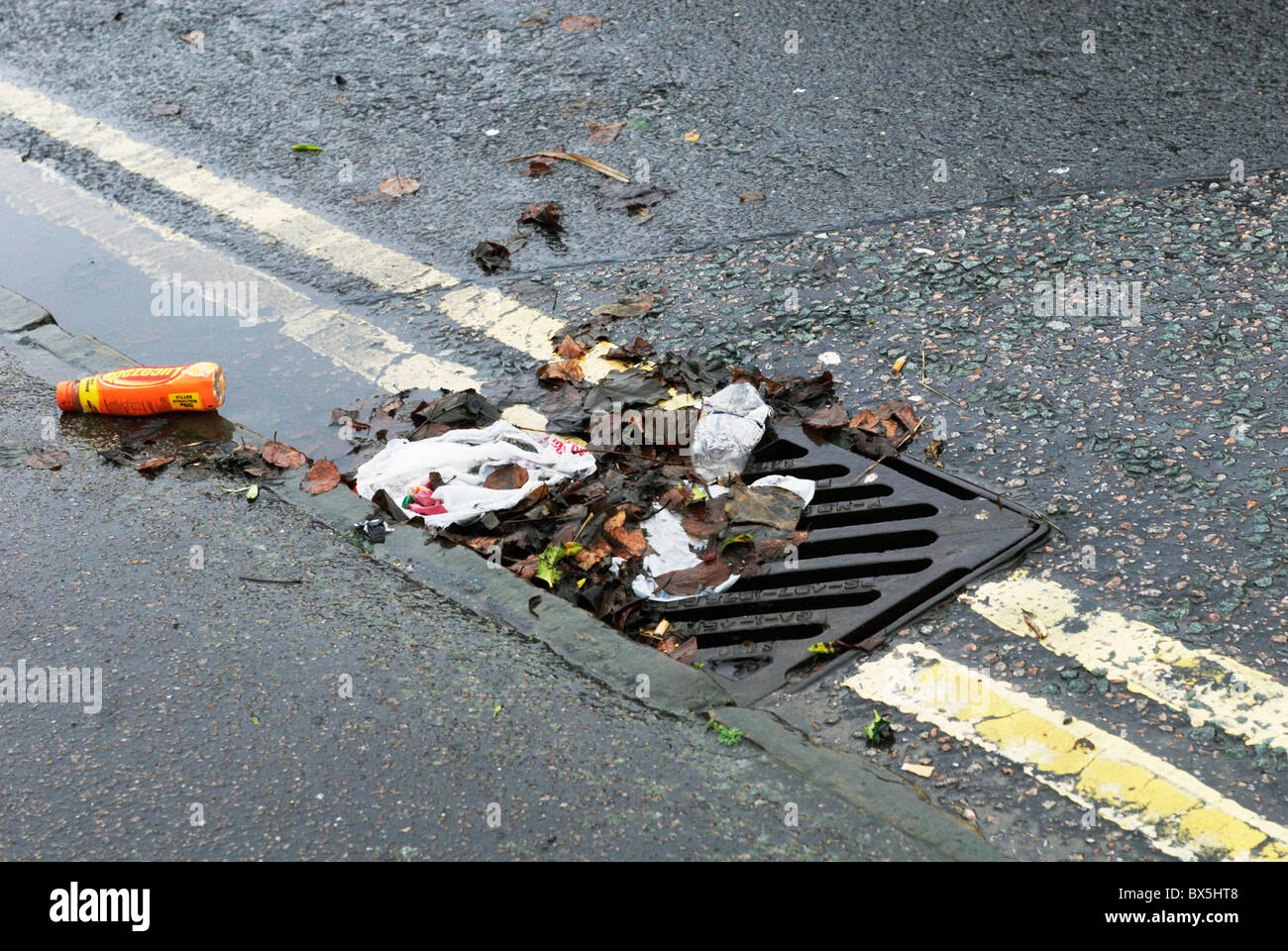 Drain gutter in the road hi-res stock photography and images - Alamy