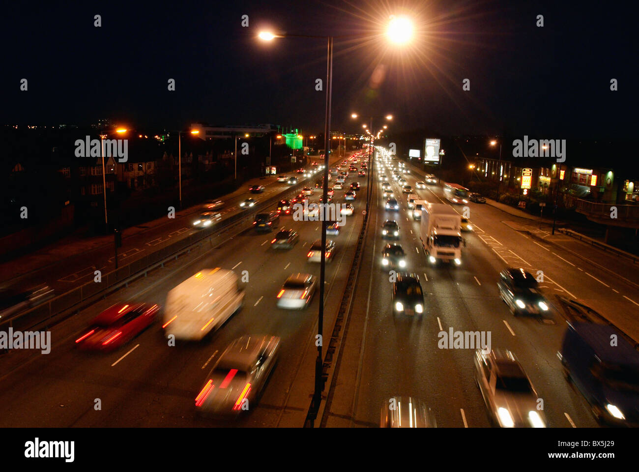 Road traffic on the A40 at night London UK Stock Photo - Alamy