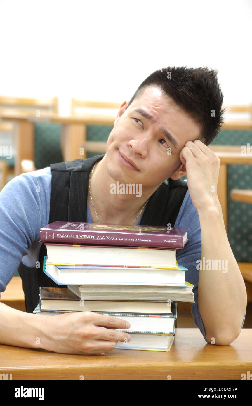 Male student sitting making hi-res stock photography and images - Alamy