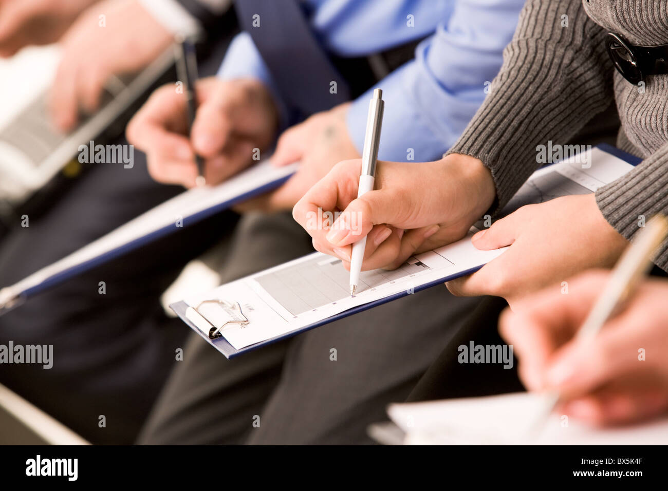 Human hands pens over hi-res stock photography and images - Alamy