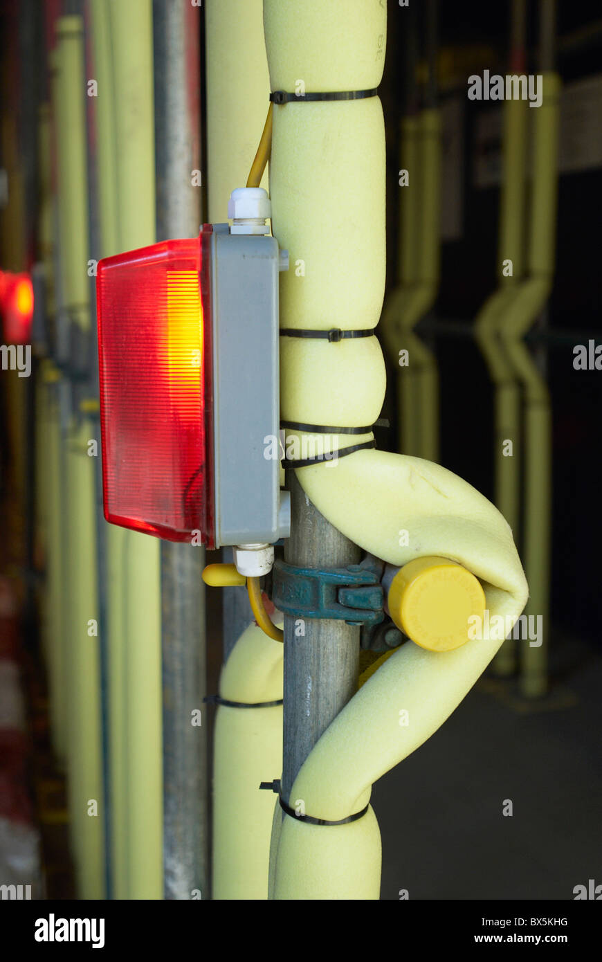 Sponge safety protection wrapped around scaffolding Stock Photo - Alamy