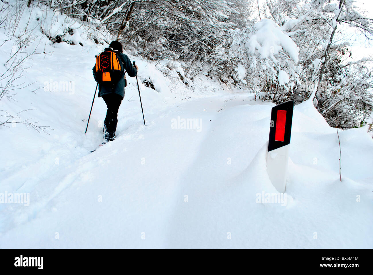 Girl on snowshoes in powder snow Stock Photo - Alamy