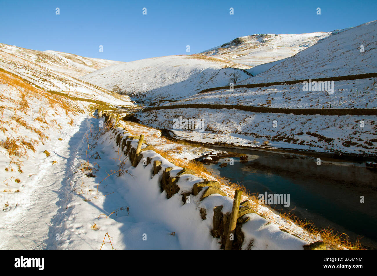 The Kinder Scout plateau and the valley of William Clough in winter ...