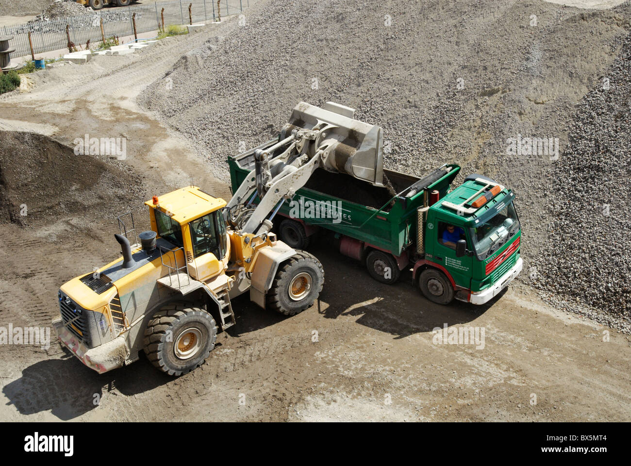 Loading gravel at an aggregate plant Greenwich South-East London UK ...