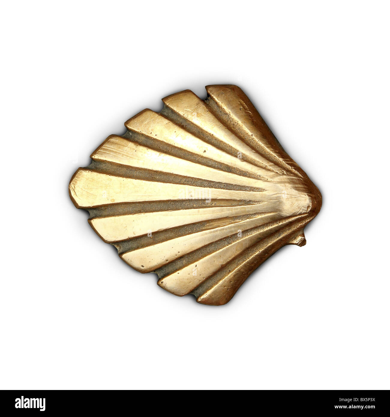 Way of Saint James symbol shell golden metal isolated Stock Photo - Alamy