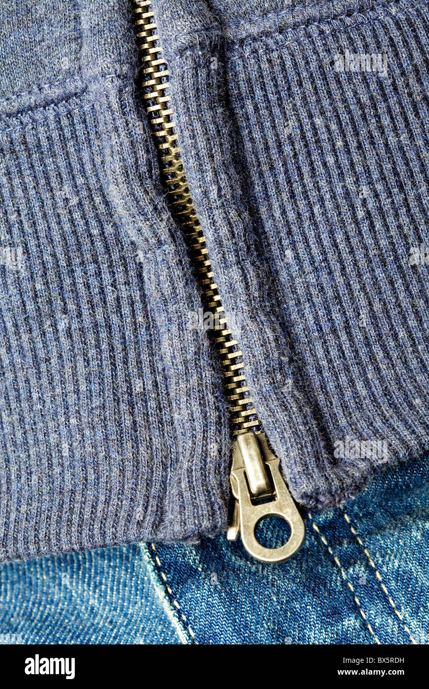 A zipper, slide fastener on a blue sweat shirt and jeans. (CTK Photo ...