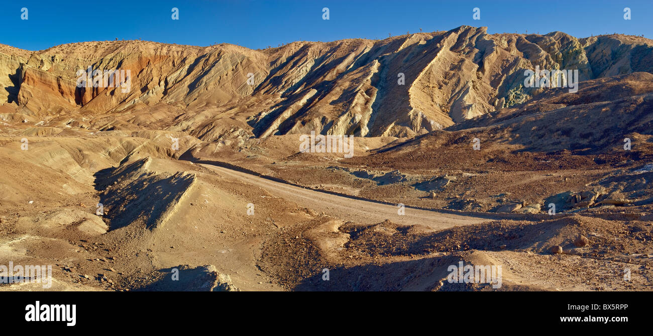 Dirt road, rock formations at Rainbow Basin National Natural Landmark ...