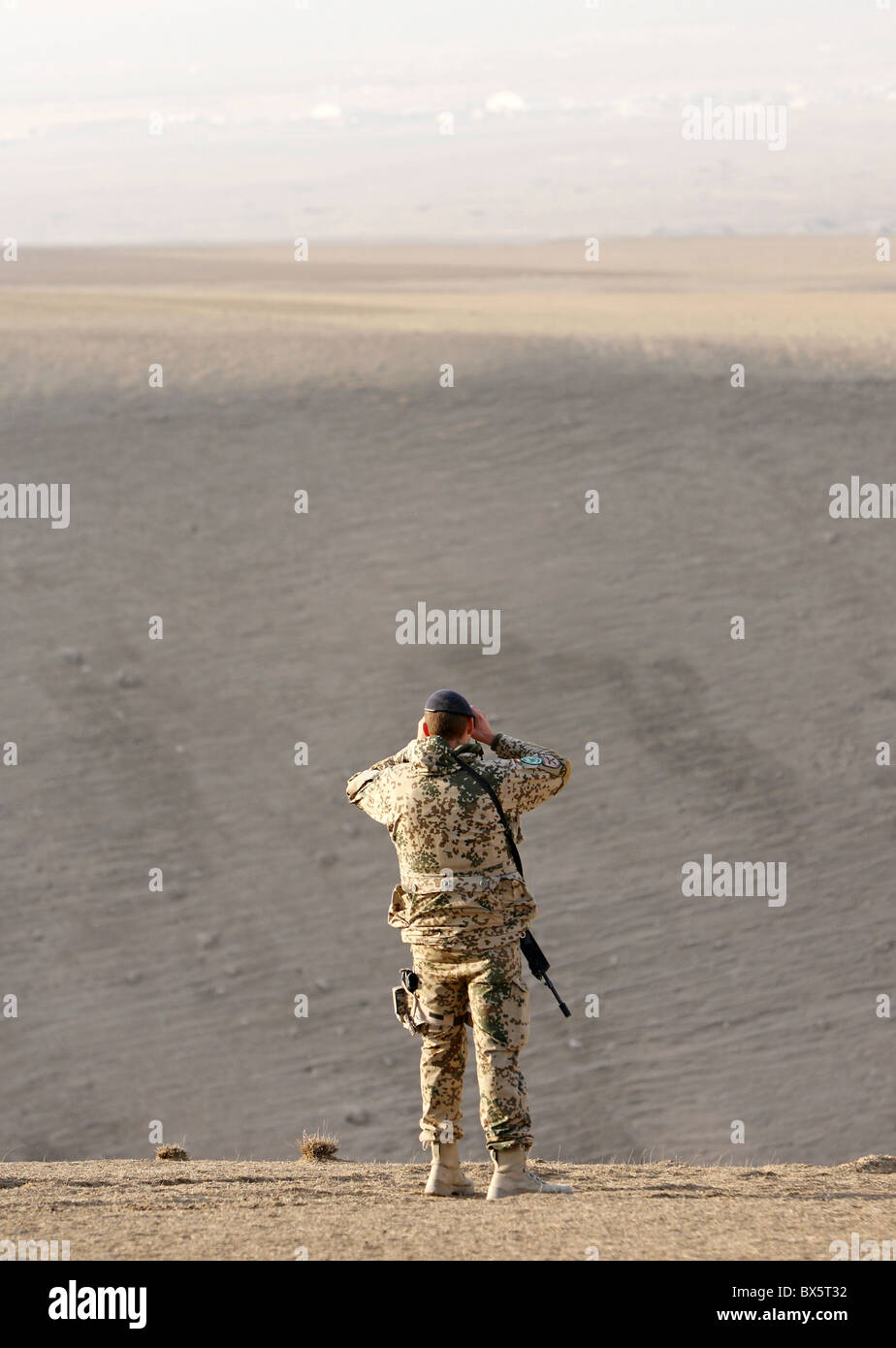 Soldier of the German Armed Forces serving in ISAF protective forces is ...