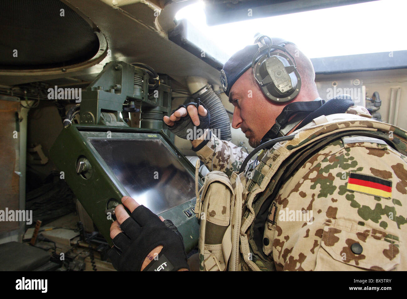 ISAF soldier in a Fox tank, Mazar-e Sharif, Afghanistan Stock Photo - Alamy