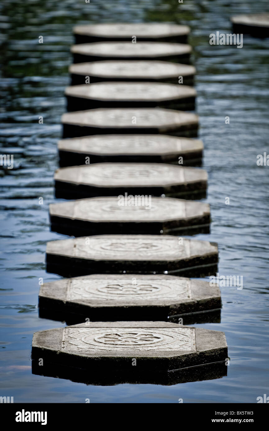stone steps floating on the water, Tirtagangga water palace, Bali ...
