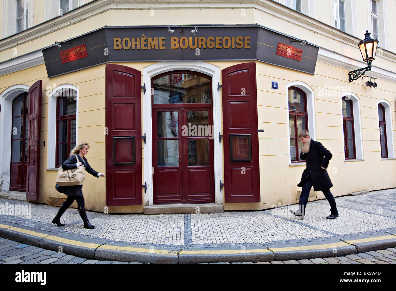 Prague, two woman walking around restaurant Le Degustation Boheme ...