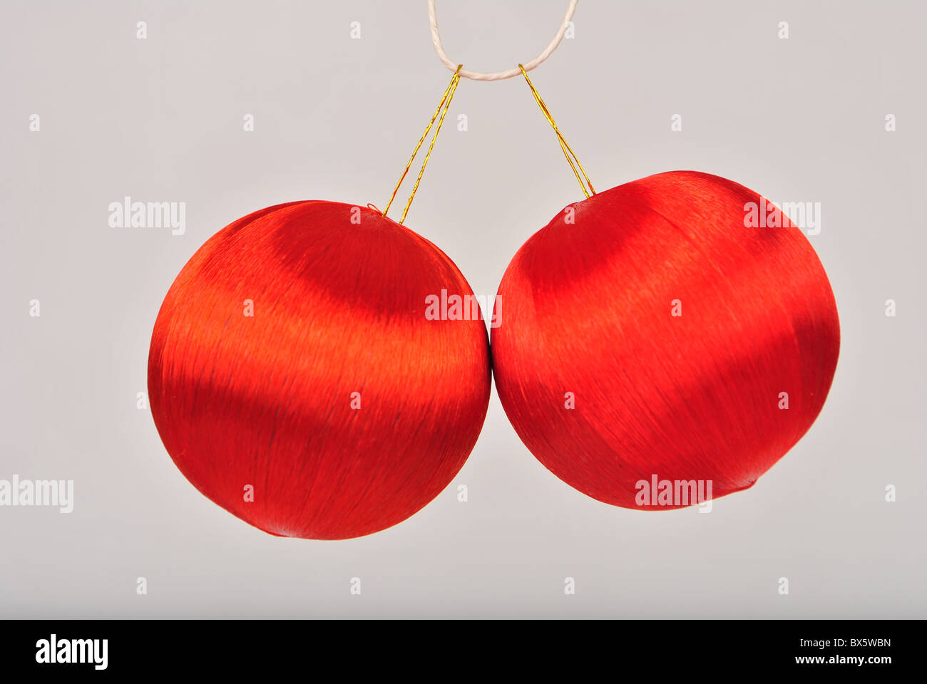 Christmas decorations red balls in fabric Stock Photo - Alamy