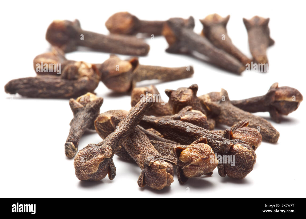 Spice cloves on white background Stock Photo - Alamy