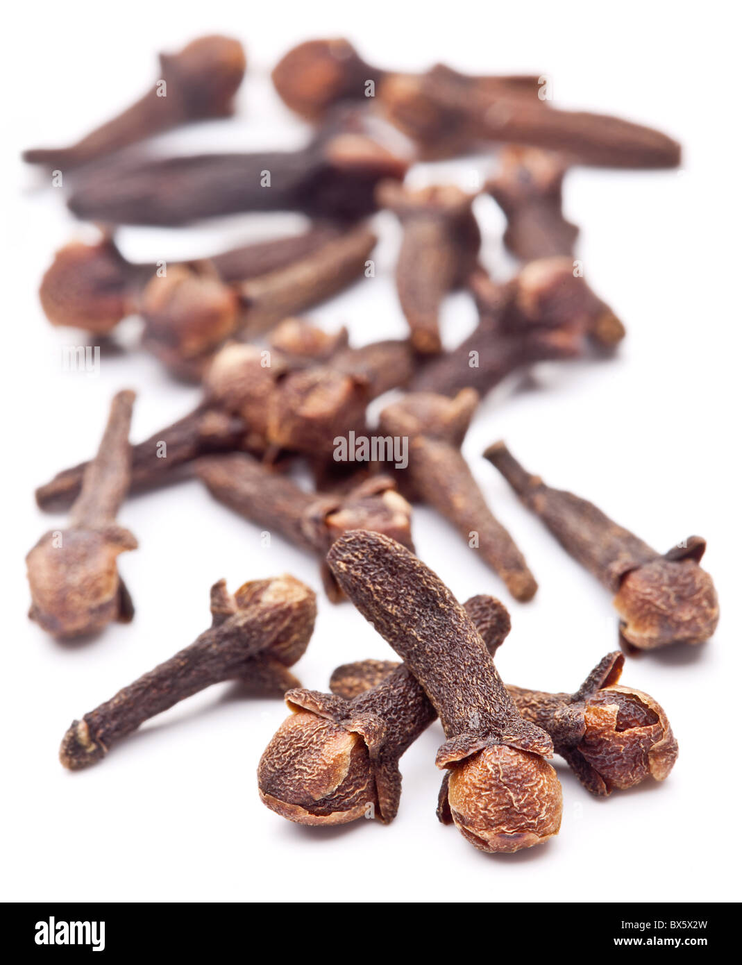 Spice cloves on white background Stock Photo - Alamy