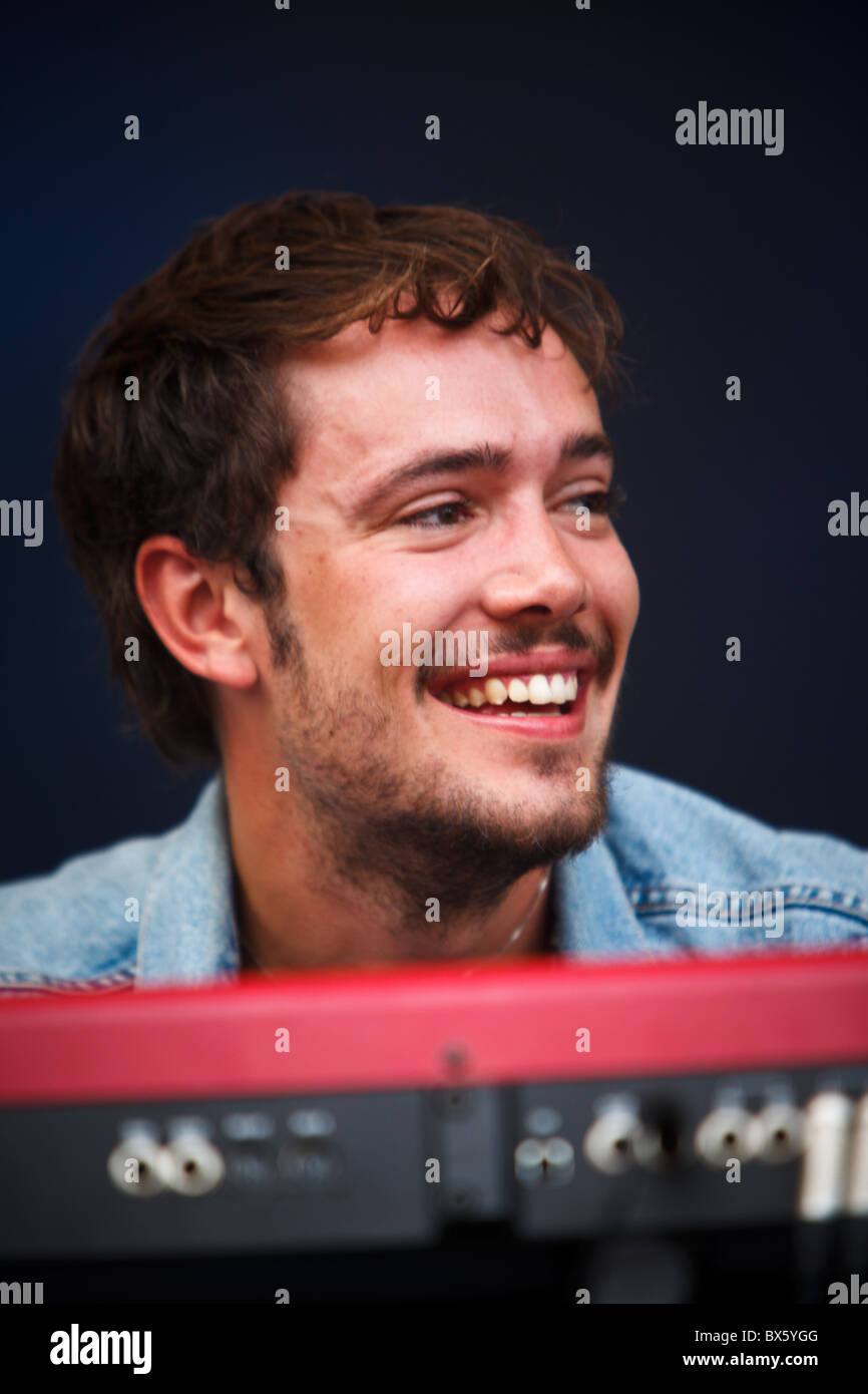 Ben Lovett of the band Mumford & Sons plays keyboards and sings vocals ...