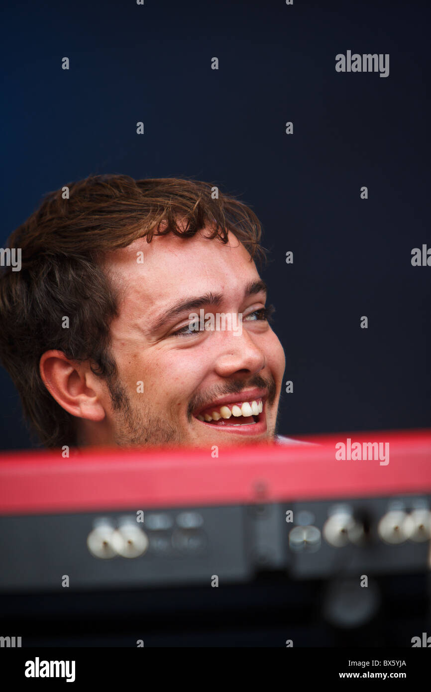 Ben Lovett of the band Mumford & Sons plays keyboards and sings vocals ...