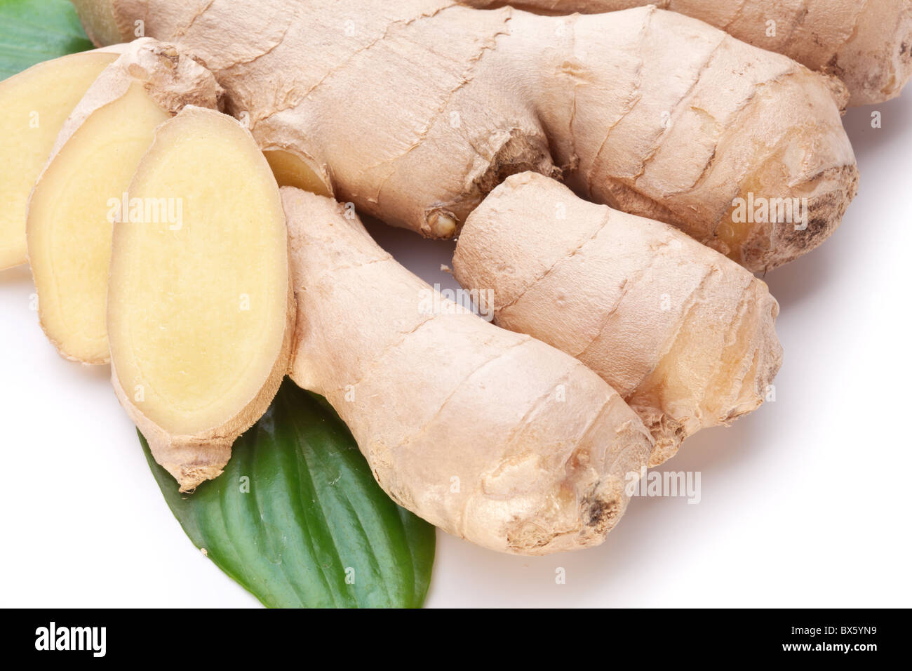 Fresh ginger with leaves isolated on white background Stock Photo - Alamy