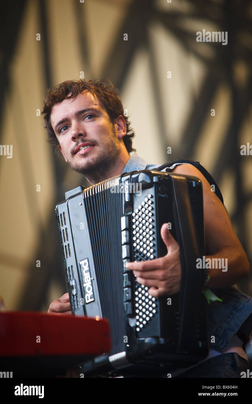 Ben Lovett of the band Mumford & Sons plays accordion and sings vocals ...