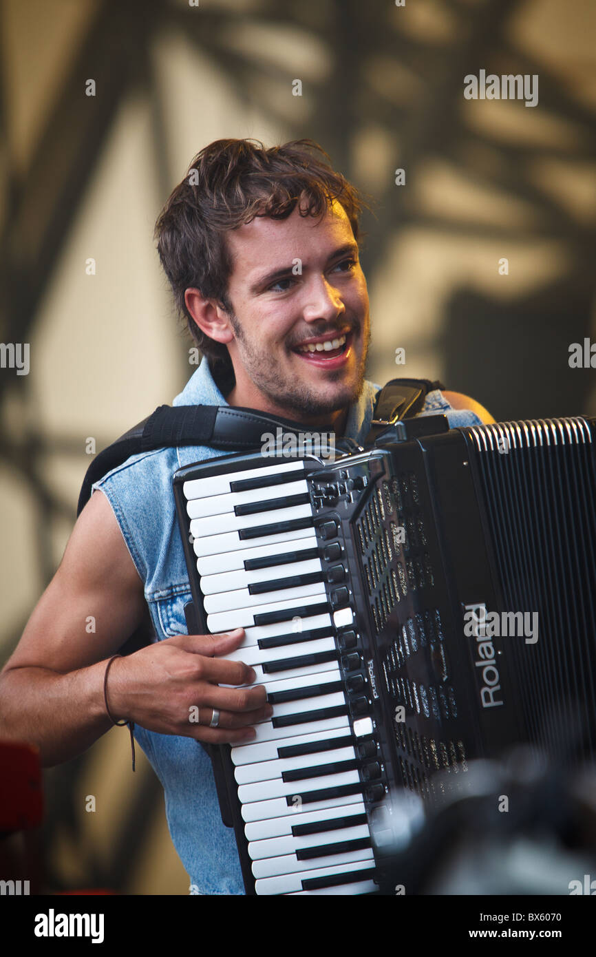 Ben Lovett of the band Mumford & Sons plays accordion and sings vocals ...