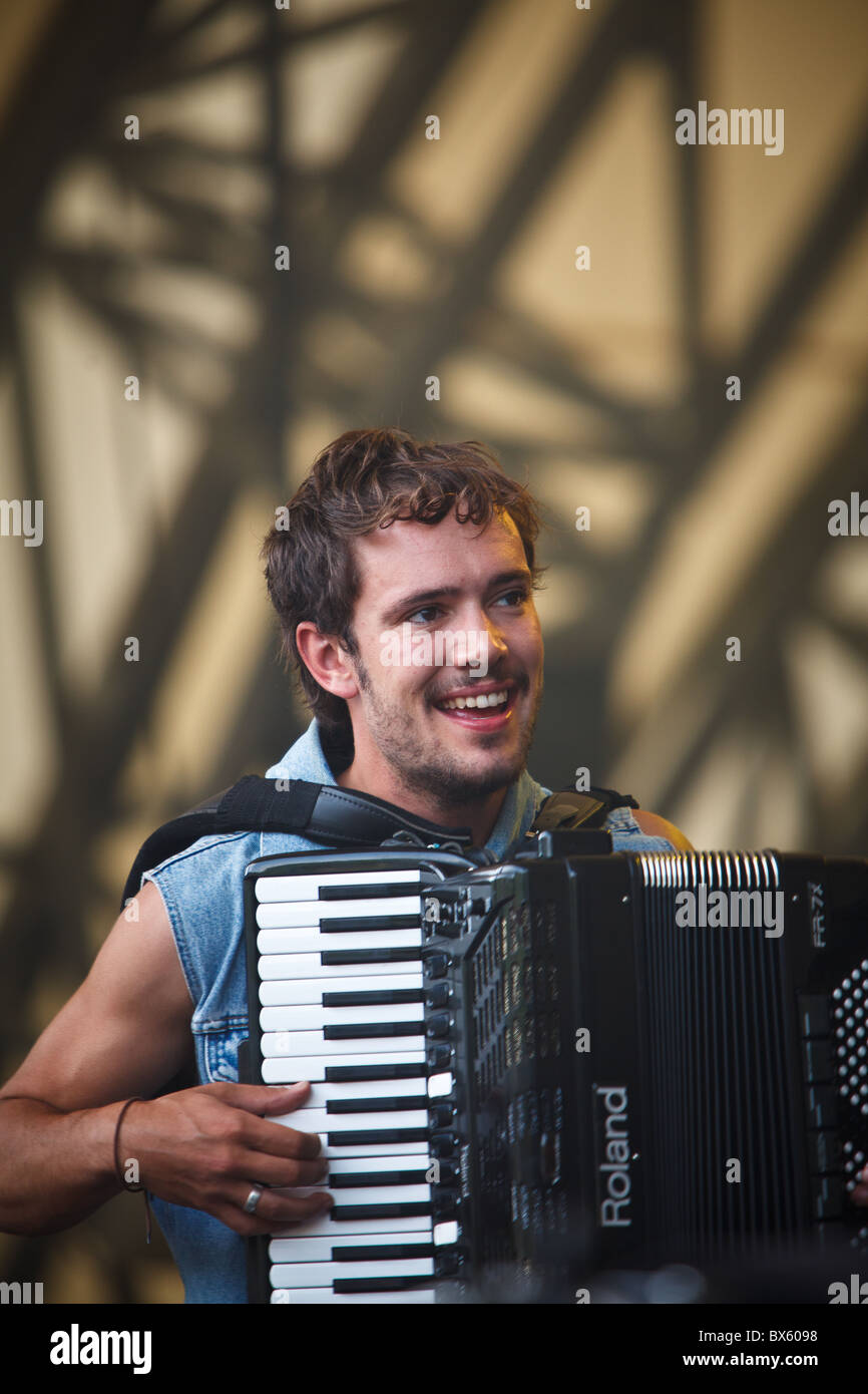 Ben Lovett of the band Mumford & Sons plays accordion and sings vocals ...