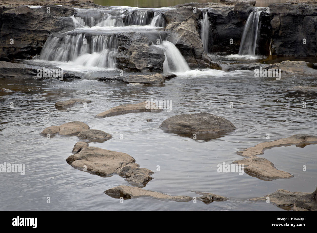Waterfall and pool with rocks, Bourke's Luck Potholes, South Africa ...