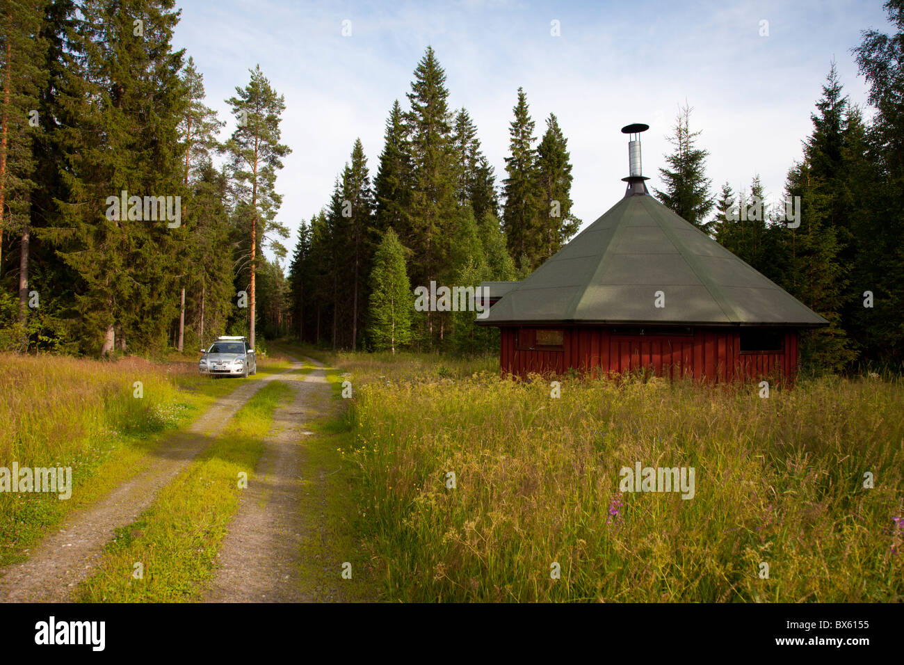 Small wooden hunting lodge in the middle of the forest , Finland Stock ...