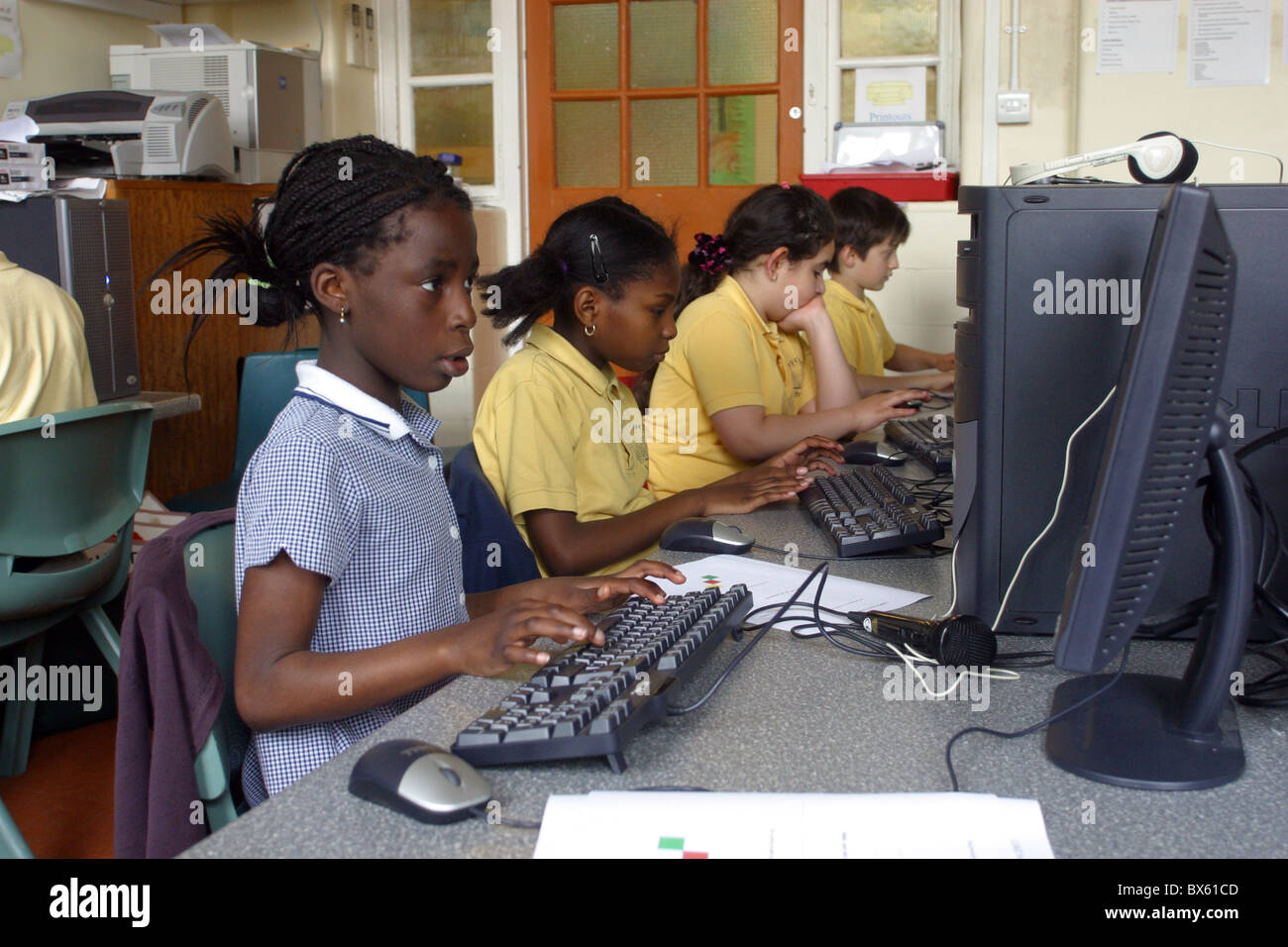 primary school girls in a computer class Stock Photo - Alamy