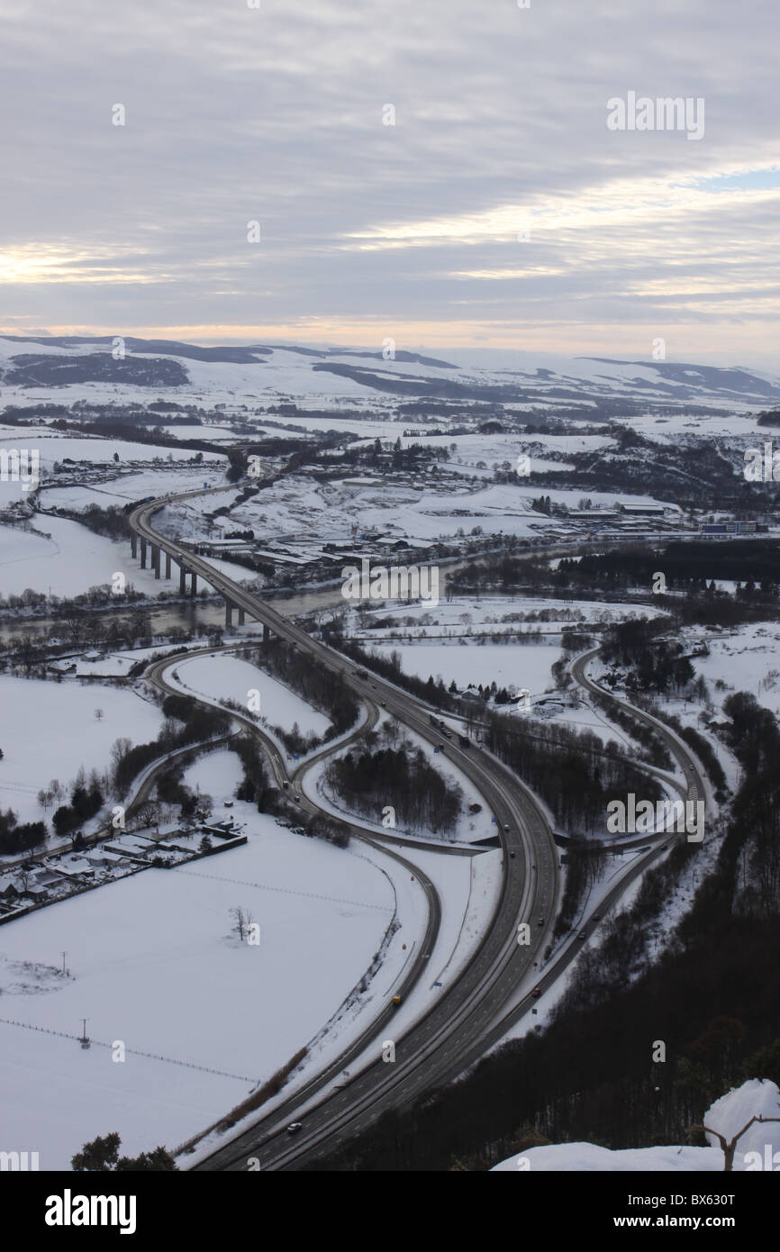 aerial view of road junction on M90 in winter near Perth Scotland ...