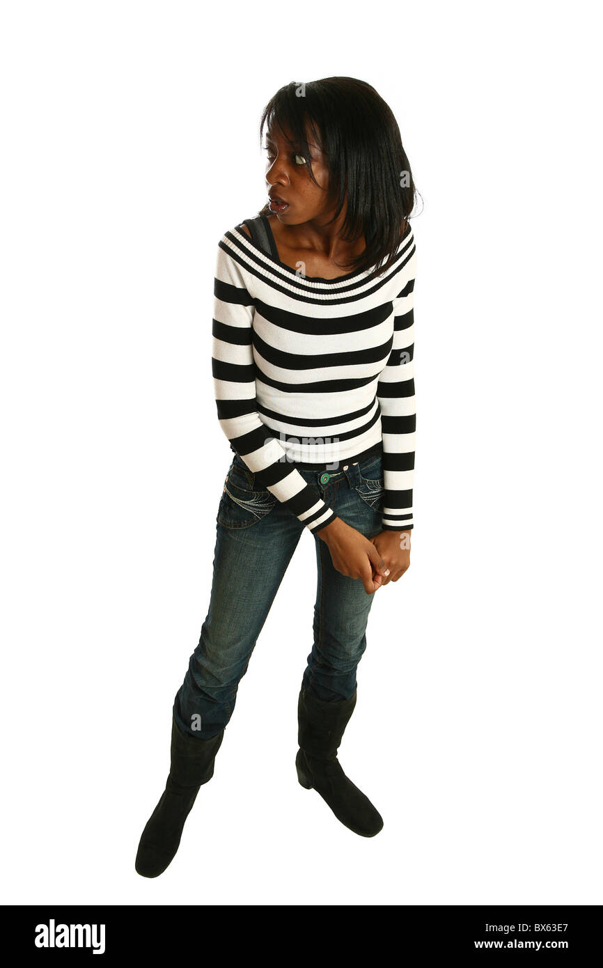 Attractive 20 year old African American woman standing, looking behind ...