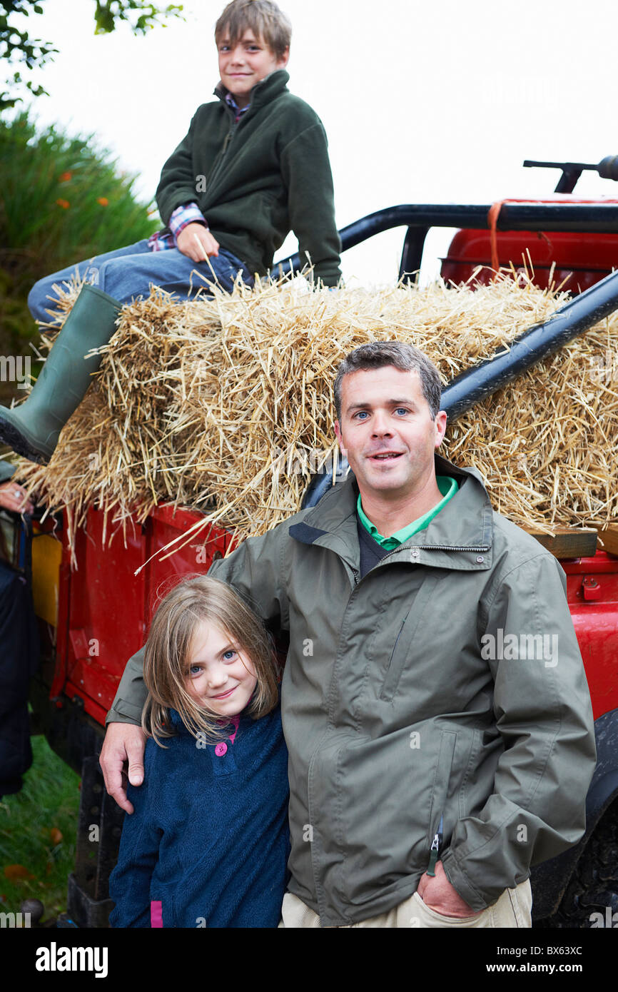Father and children with 4x4 landrover Stock Photo - Alamy