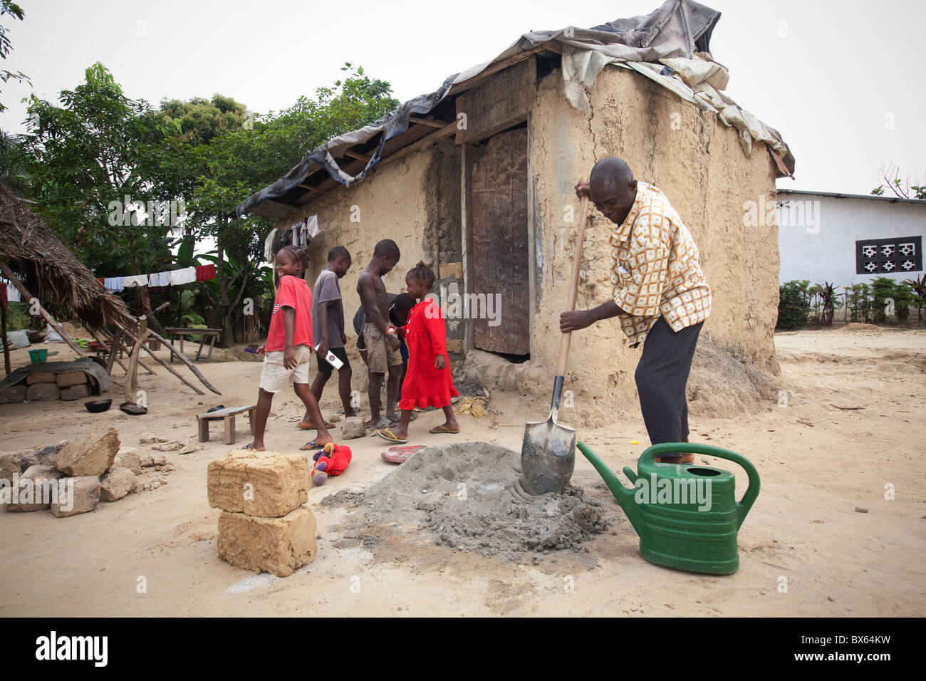 A man builds a house in Kakata, Liberia, West Africa Stock Photo - Alamy